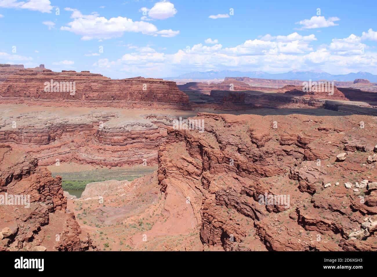 Deep canyon cut down by a river exposing amazing rock formations in ...