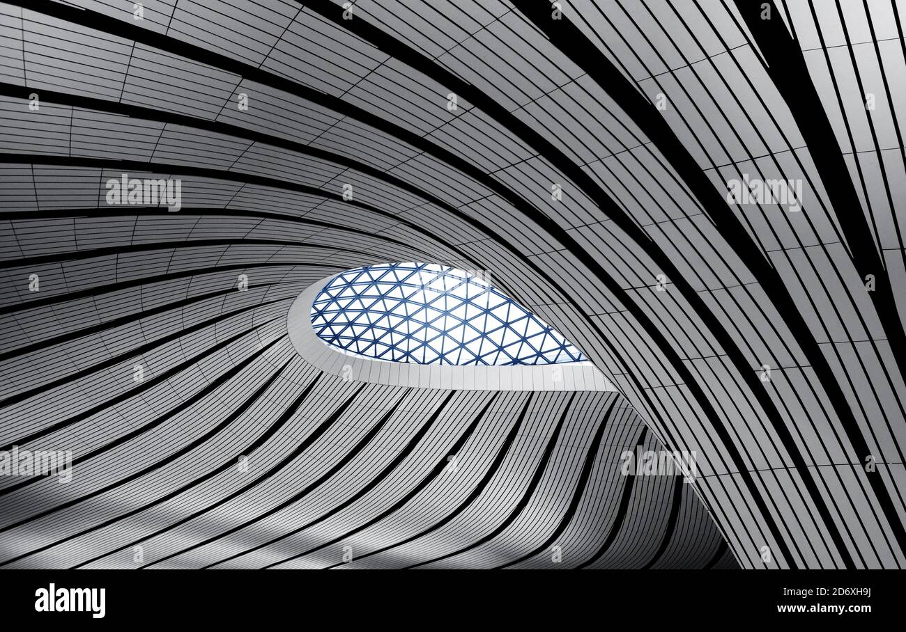 Modern architectural structure with geometric and curvilinear pattern ...