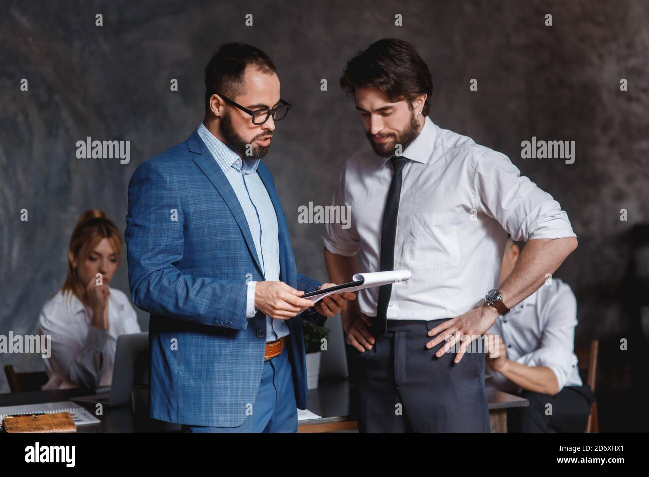 caucasian colleagues disputing having disagreement at work blaming each ...