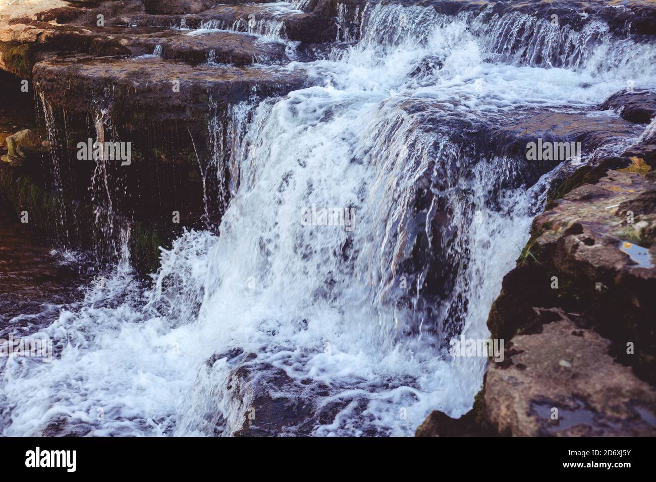 Beautiful view of the waterfall streaming down the cliffs - great for ...