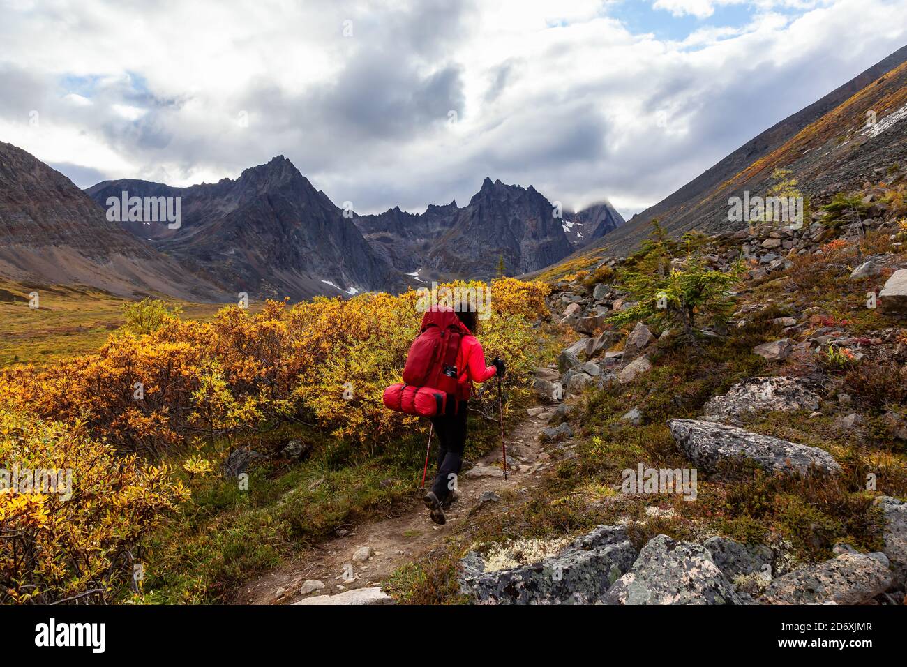 Woman Backpacking on Scenic Rocky Hiking Trail Stock Photo - Alamy