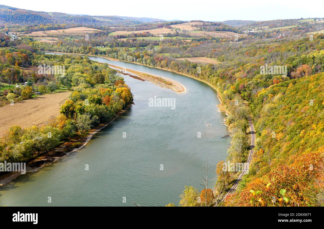 The aerial view of the Susquehanna River surrounded by striking color ...
