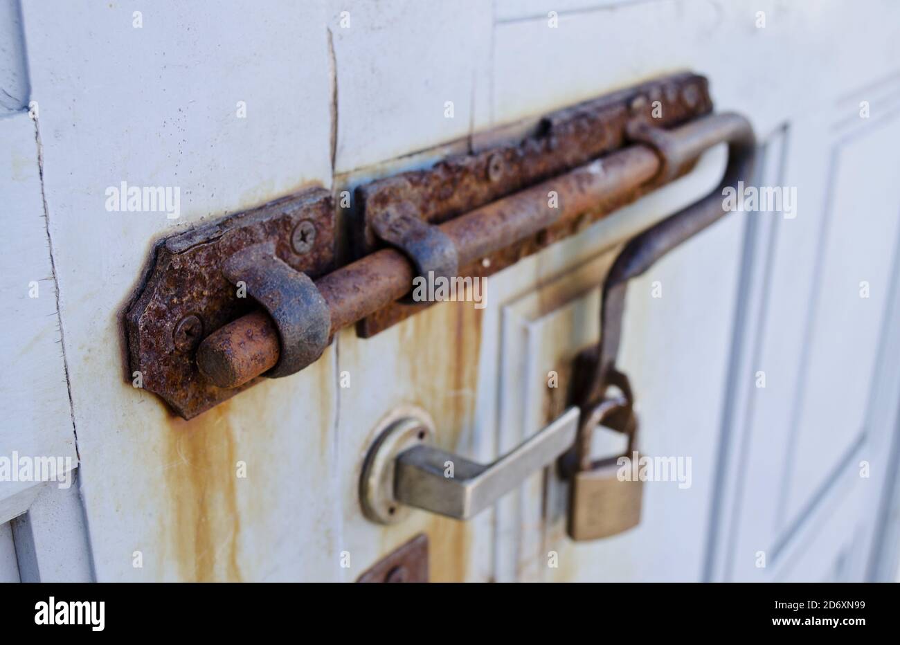 Closeup shot of a rusty door lock on a wooden door Stock Photo - Alamy