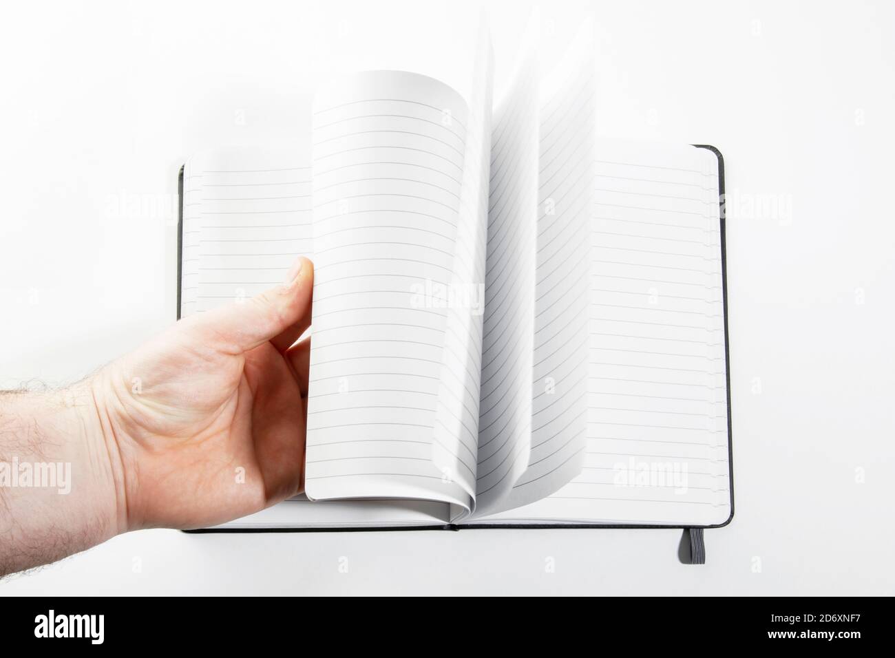 Flipping through book hi-res stock photography and images - Alamy