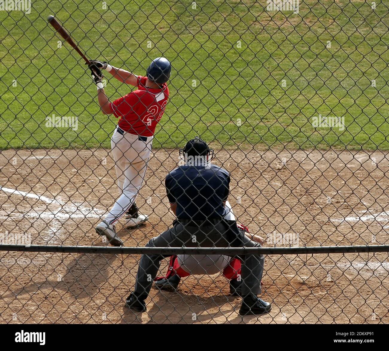View of athletes playing baseball in the field Stock Photo - Alamy