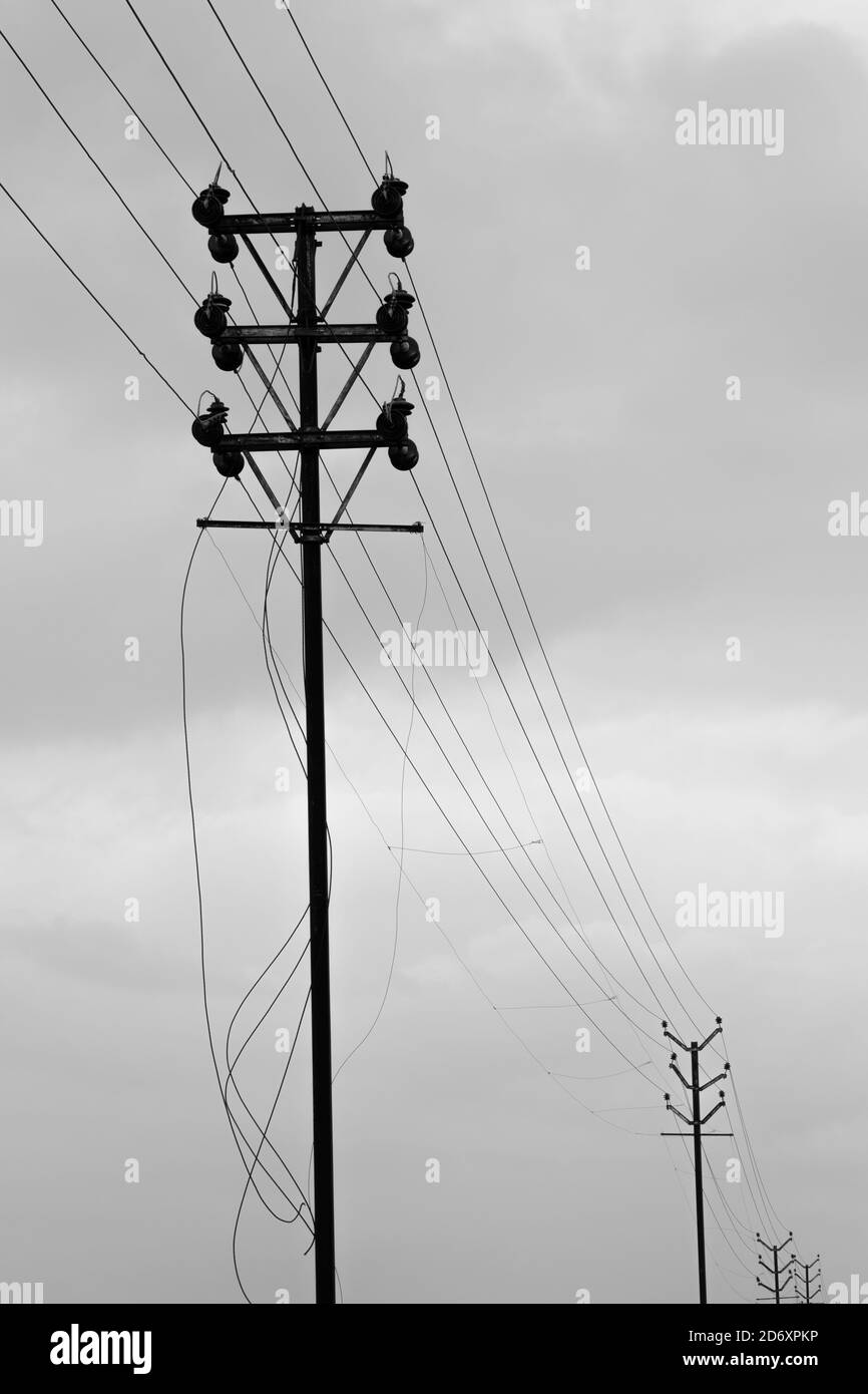 continuous power lines in monochrome Stock Photo - Alamy