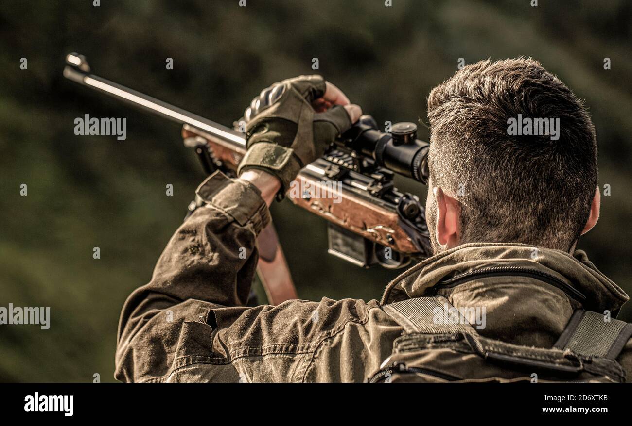 Hunting period. Male with a gun. Close up. Hunter with hunting gun and ...
