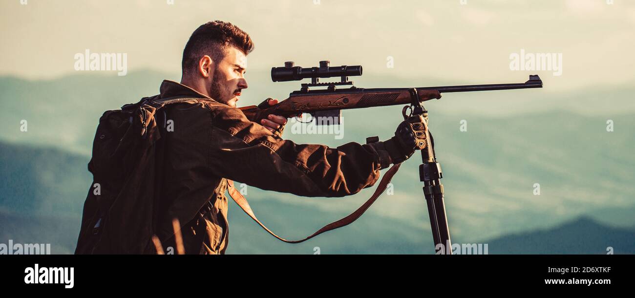 Hunting period. Male with a gun. Hunter with hunting gun and hunting ...