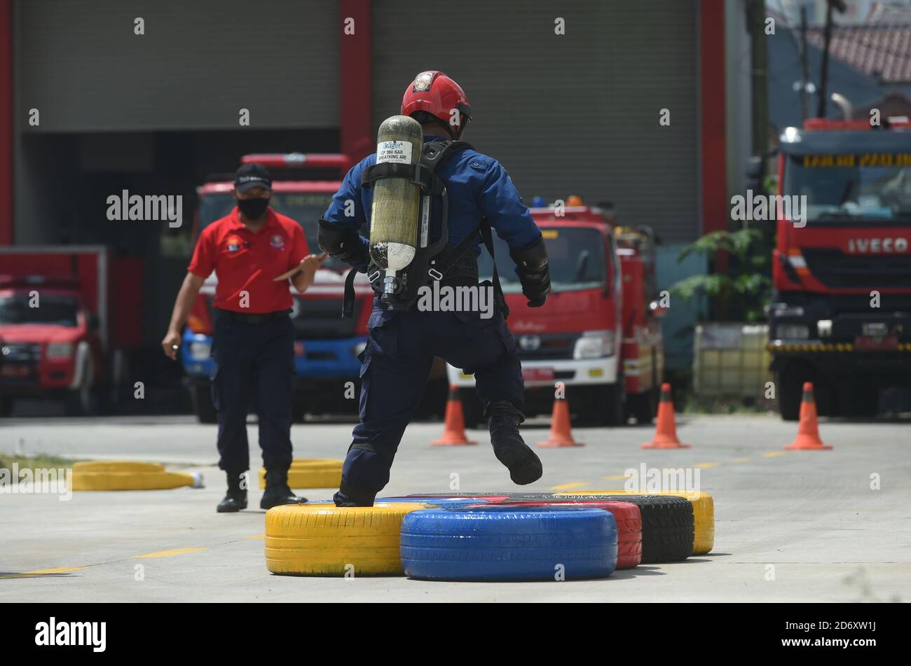 Jakarta, Indonesia. 20th Oct, 2020. A firefighter competes during the ...