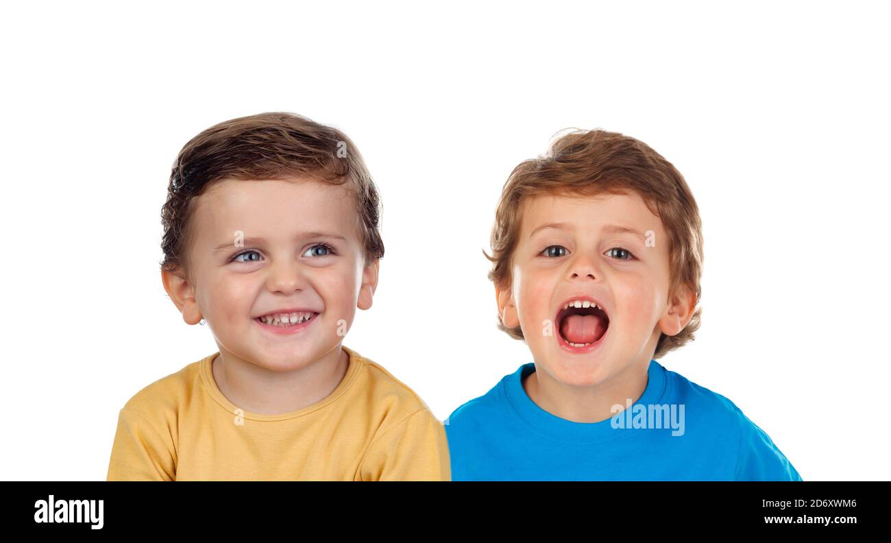 Funny child shouting and his twin brother laughing isoalted on a white ...
