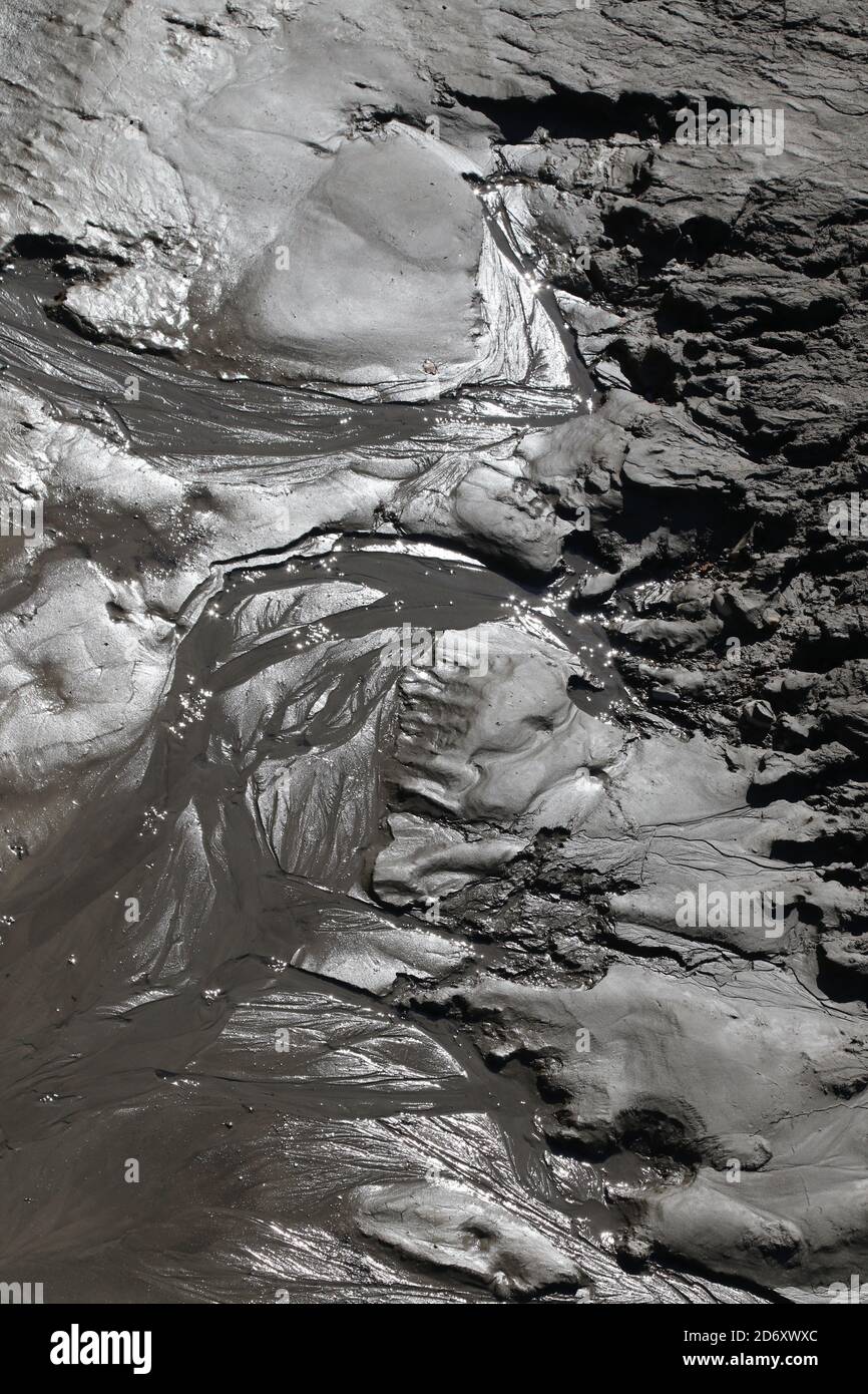 Mud residue in a river Stock Photo - Alamy