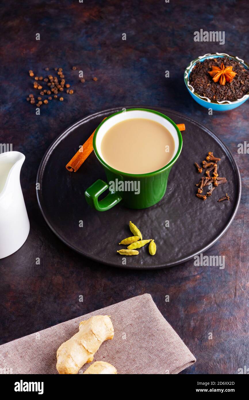 Masala chai tea. Traditional indian drink - masala tea with various ...