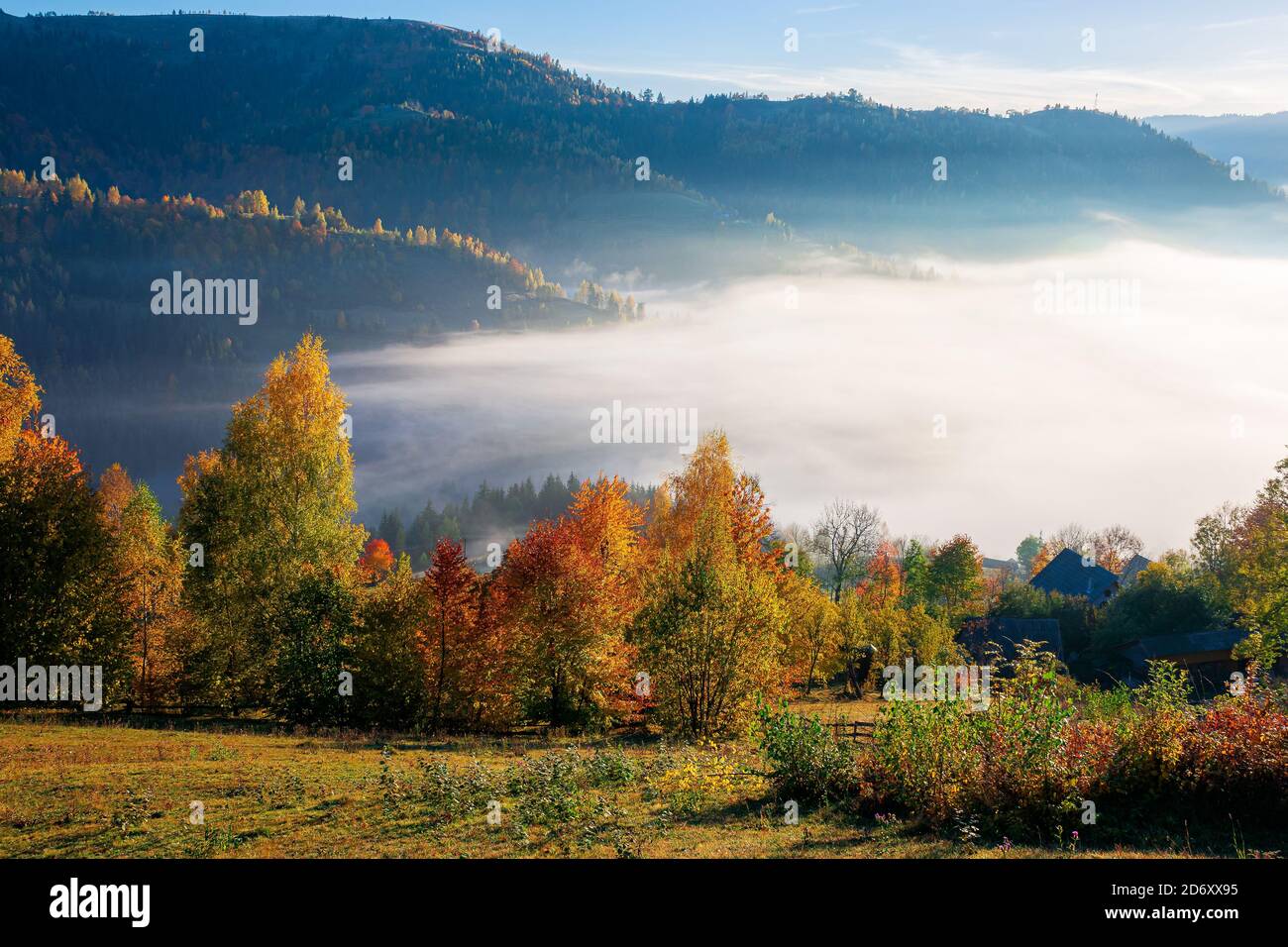 stunning rural landscape. foggy scenery at sunrise in autumn season ...