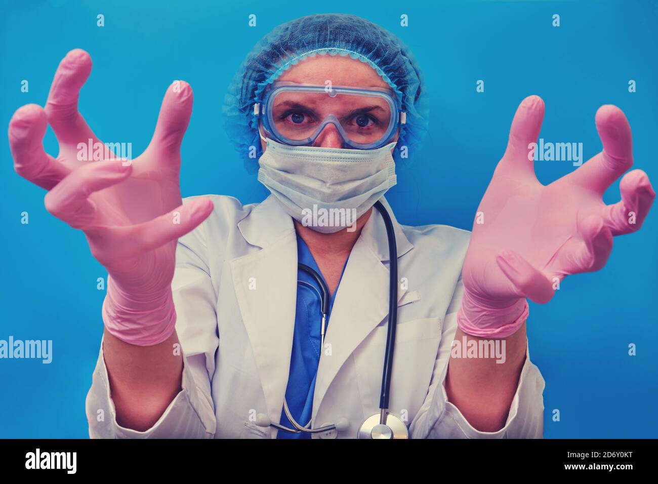 Nurse hands with red evil eyes reach for the patient, blue background ...