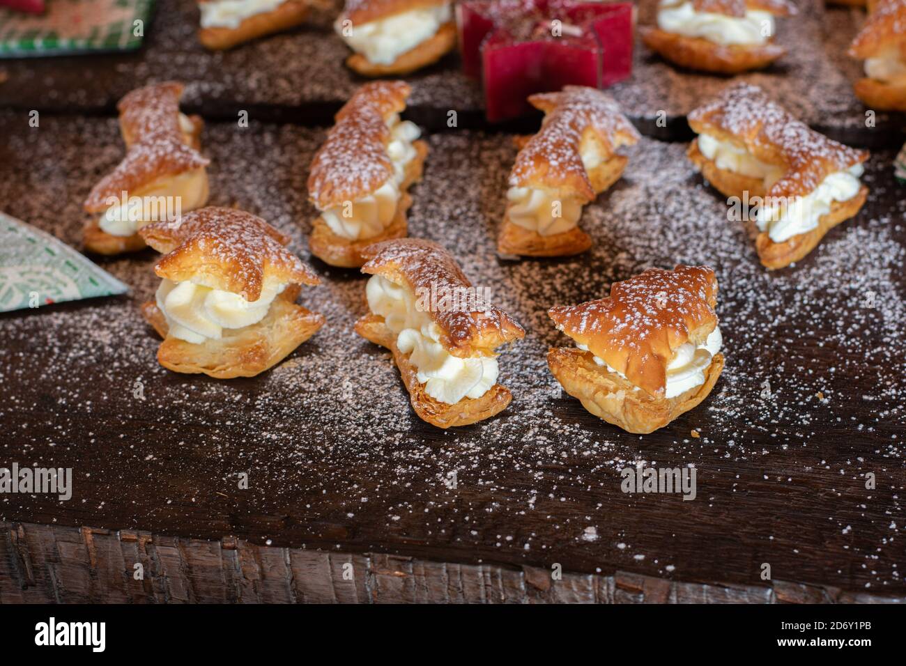 Christmas pastry on rustic wood Stock Photo - Alamy
