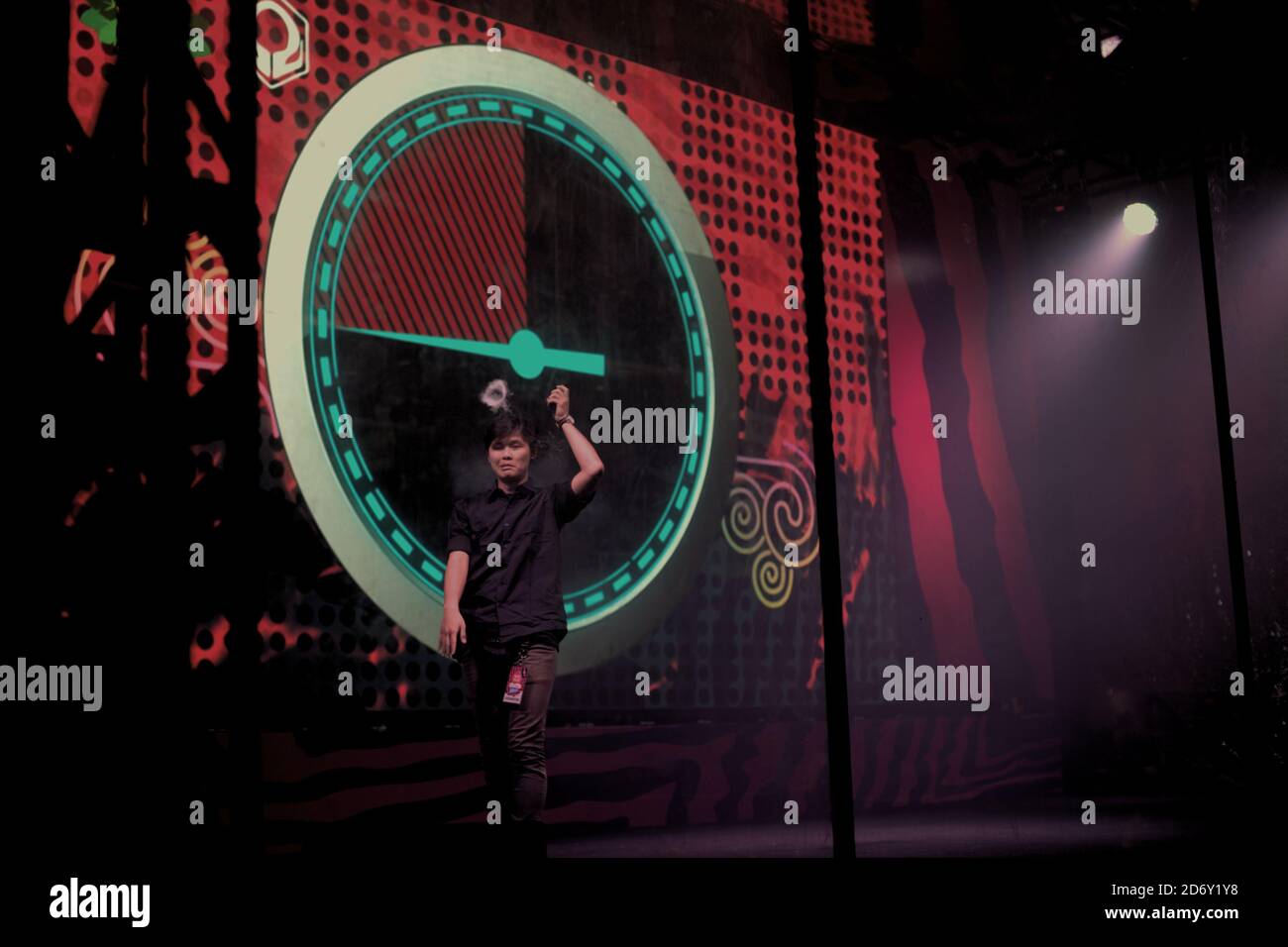 A contestant demonstrating his skills on stage, during a vape cloud ...