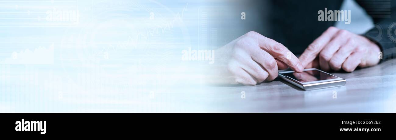 Male hands using his mobile phone; panoramic banner Stock Photo - Alamy
