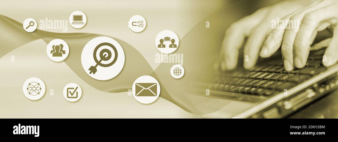 Concept of target marketing with hands typing on a laptop keyboard ...