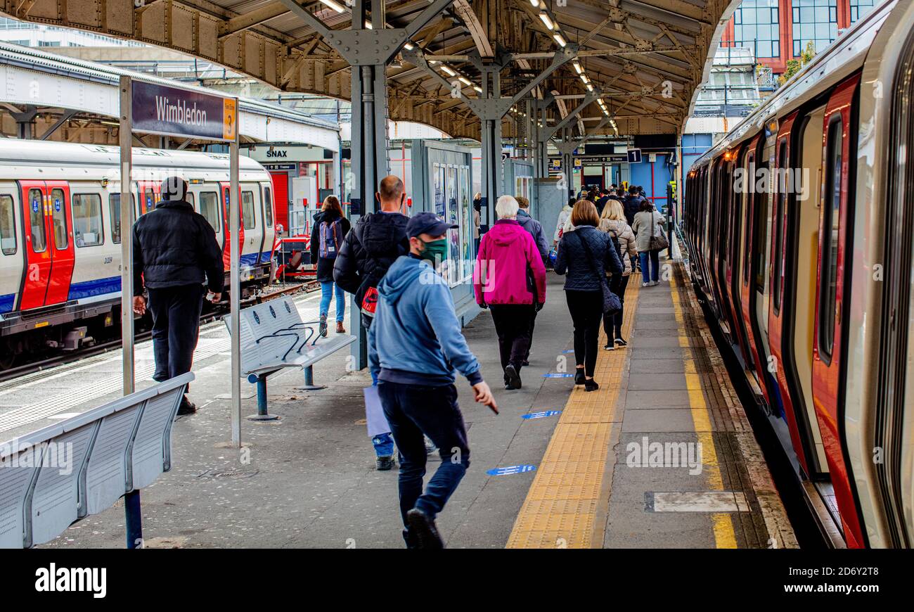 Wimbledon Underground station, on the District Line; passengers leaving ...
