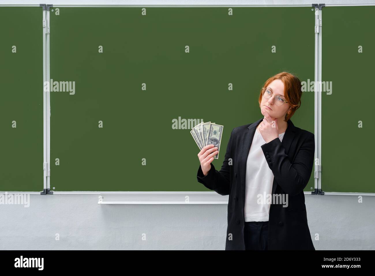Money classroom teacher hi-res stock photography and images - Alamy