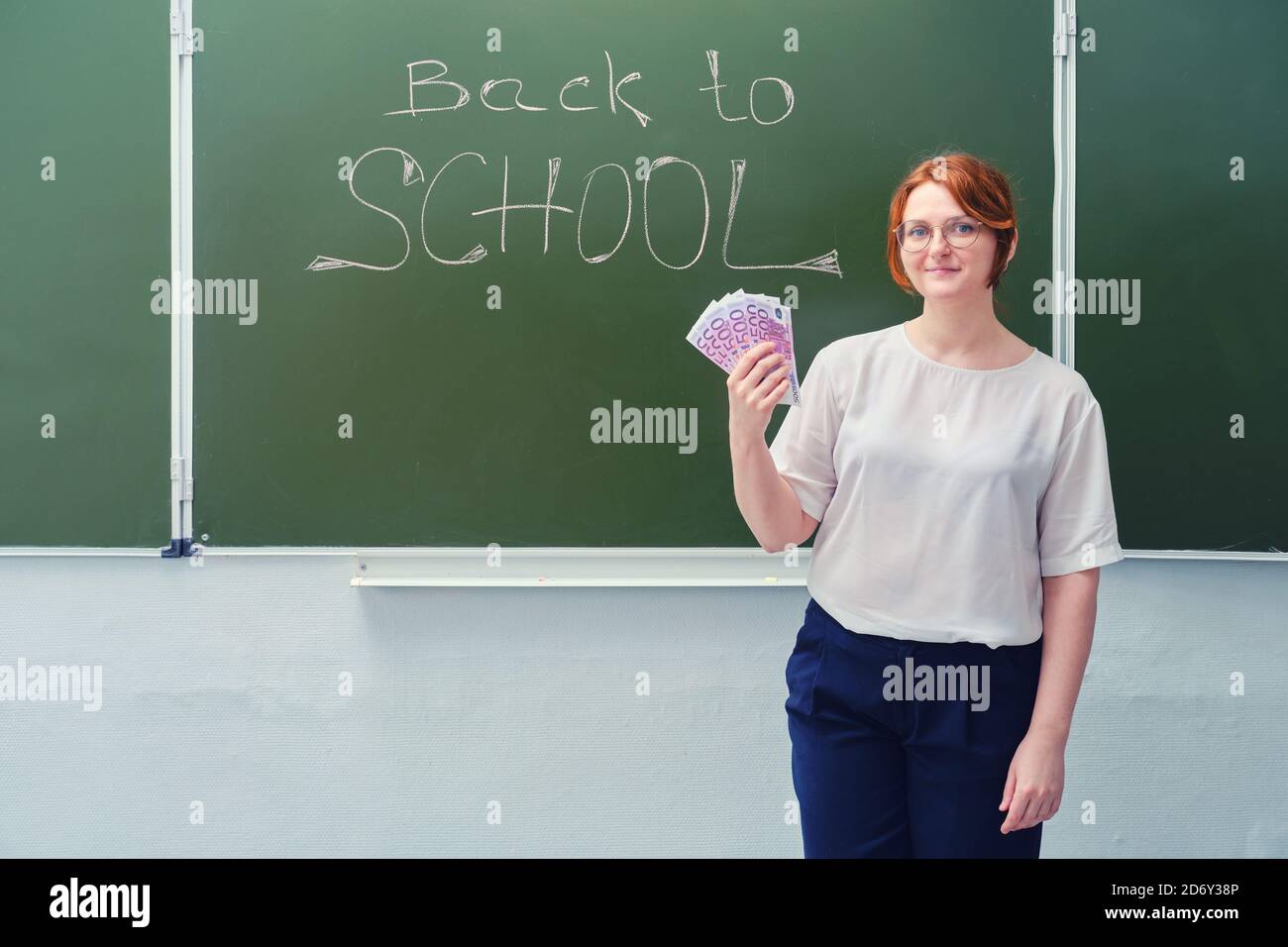 Money classroom teacher hi-res stock photography and images - Alamy