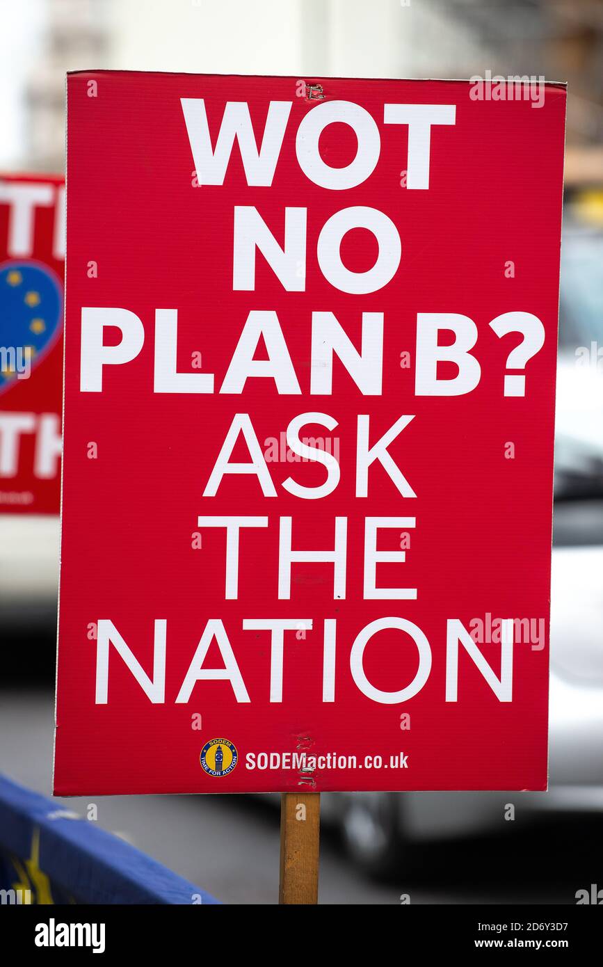Anti-Brexit campaign poster being used by protesters outside the Houses ...