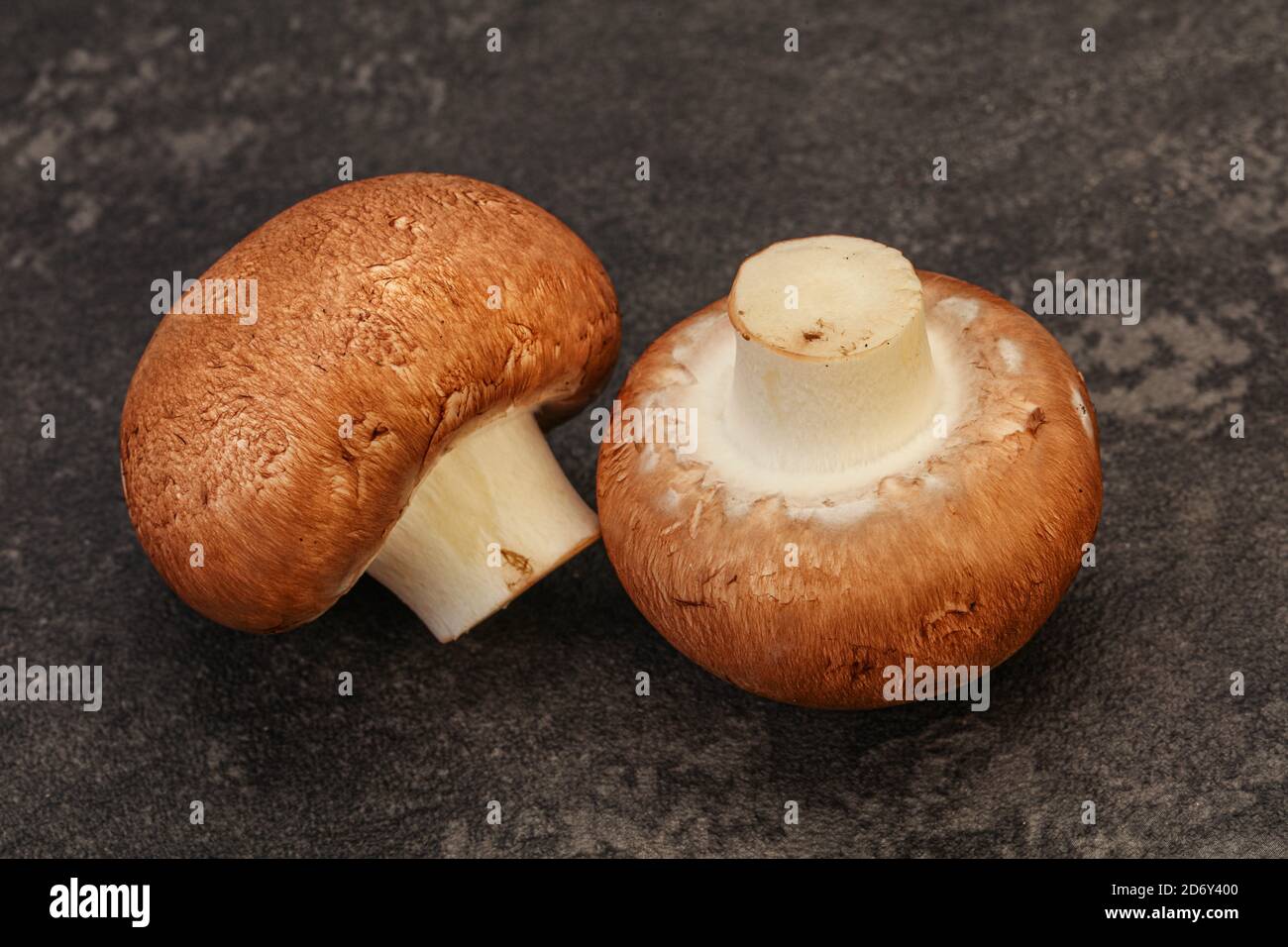 Tasty Raw Brown Champignons over background Stock Photo - Alamy