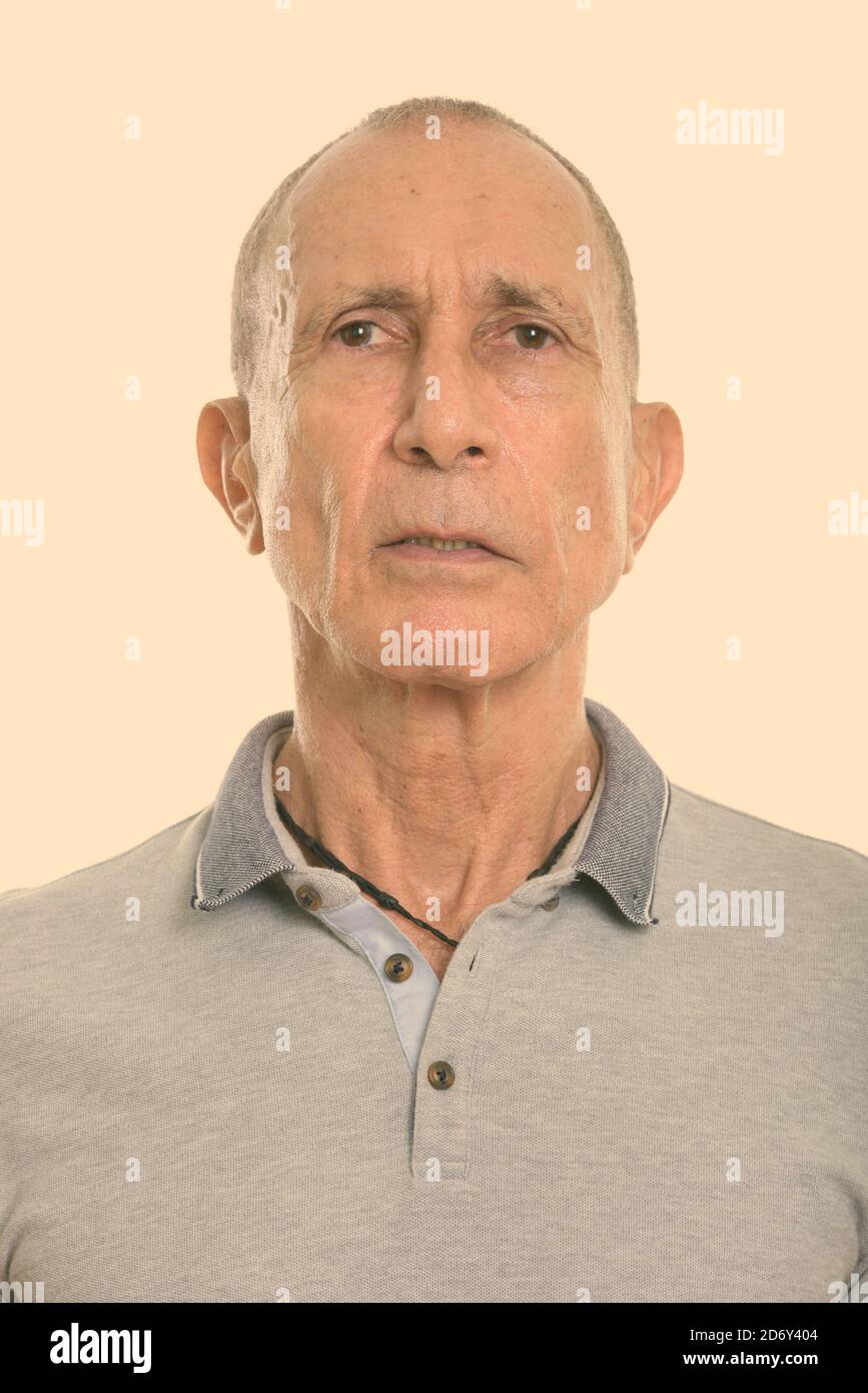 Face of bald senior man looking at camera Stock Photo - Alamy