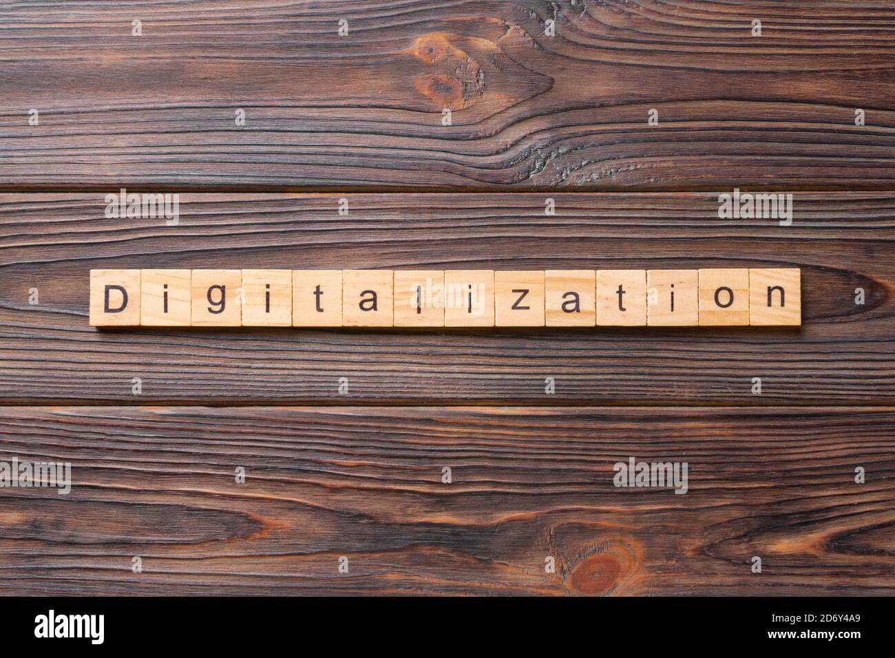 digitalization word written on wood block. digitalization text on ...