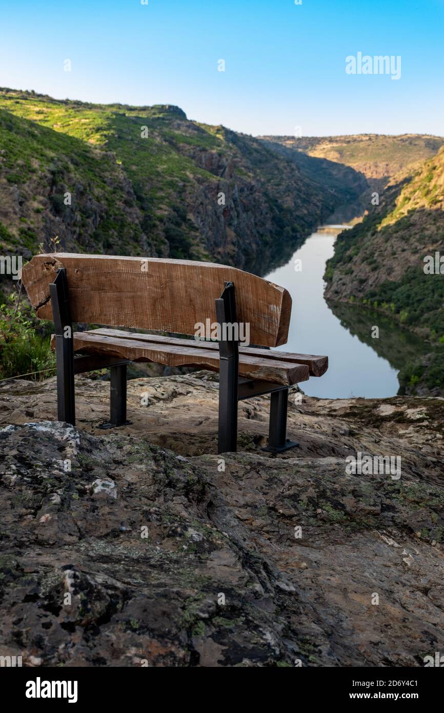 Selected focus. A bench of Mirador del Hullón with rocks, mountains ...