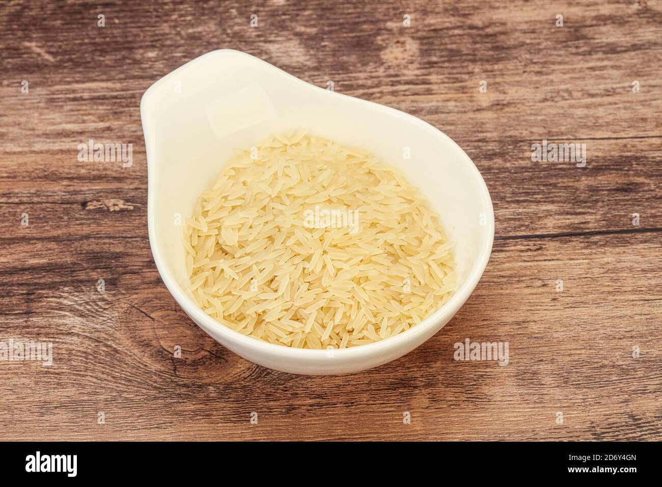 Raw Indian basmati rice in the bowl Stock Photo - Alamy