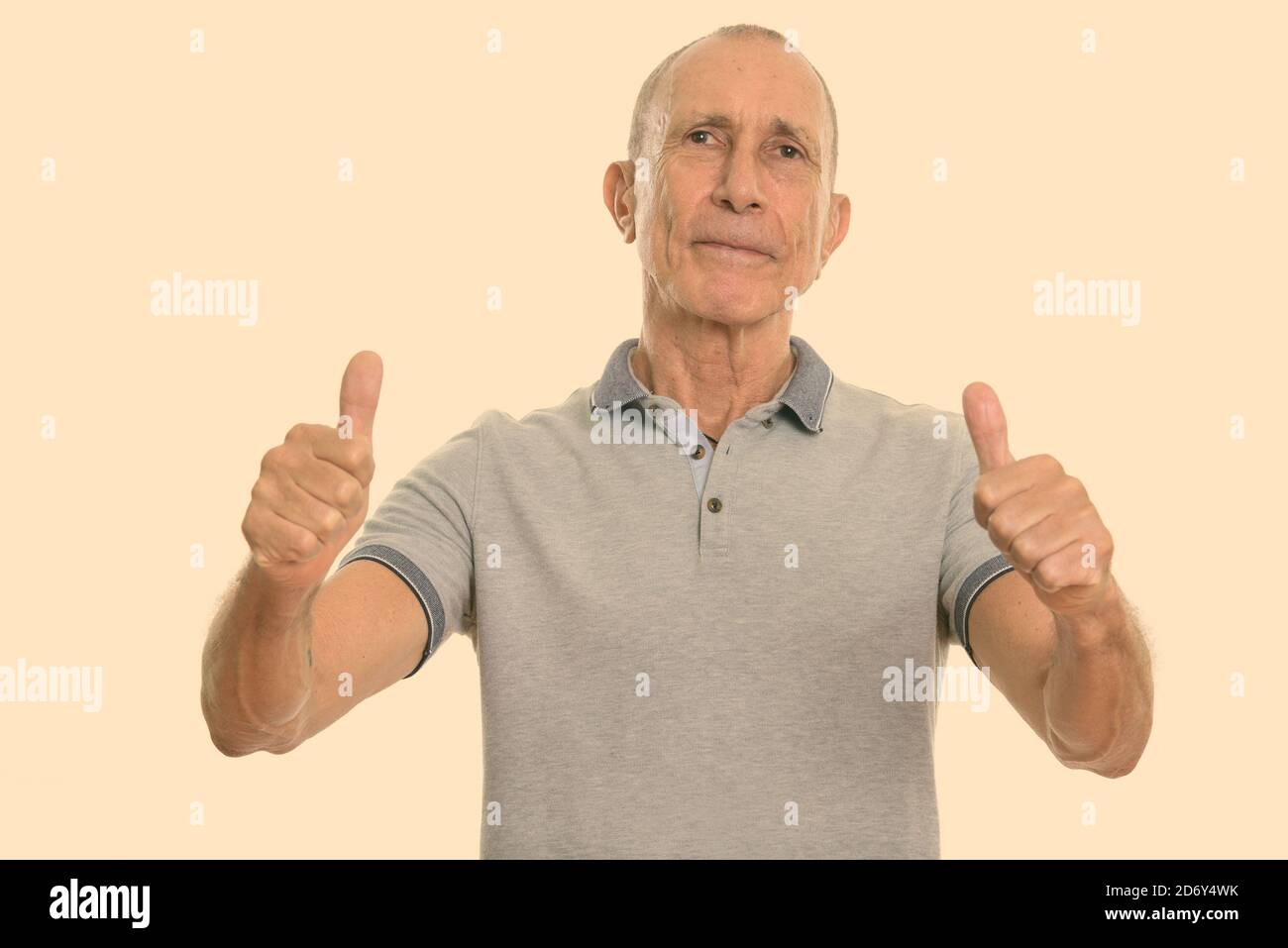 Elderly man giving thumbs up hi-res stock photography and images - Alamy