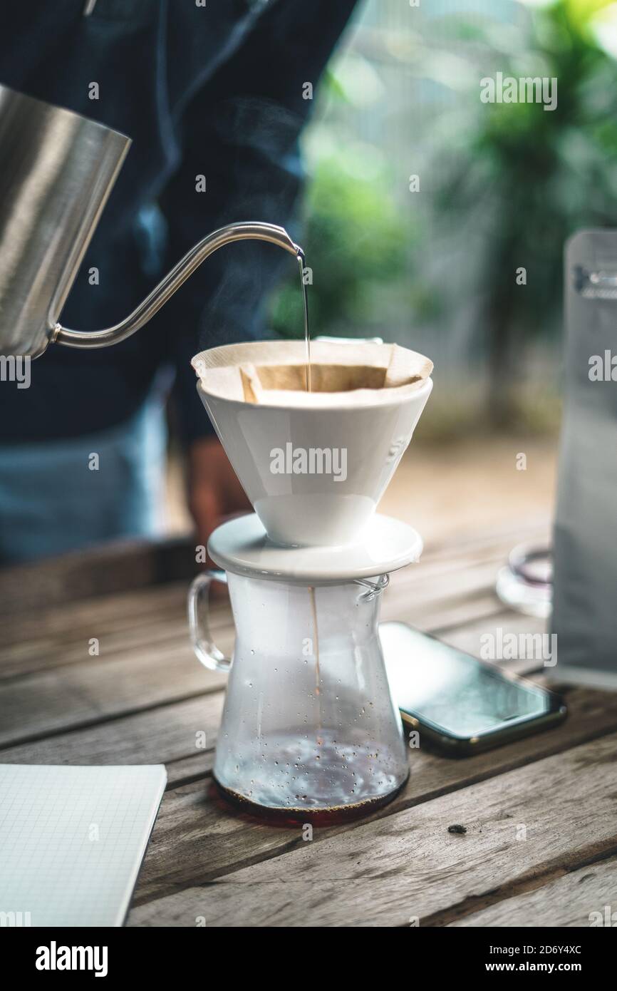 barista dripping coffee and slow coffee bar style drip coffee Stock ...