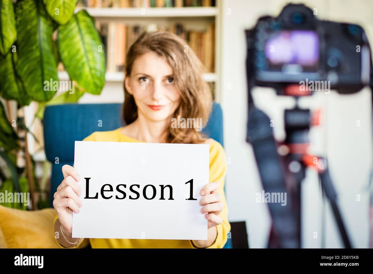 teacher or vlogger recording a lesson on camera online learning Stock ...