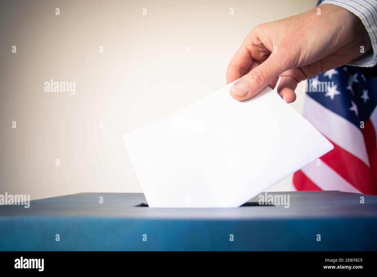 hand putting vote in ballot USA elections Stock Photo - Alamy