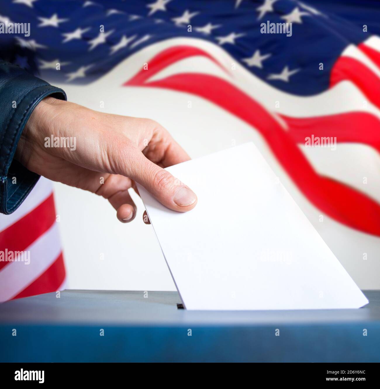 hand putting vote in ballot USA elections Stock Photo - Alamy