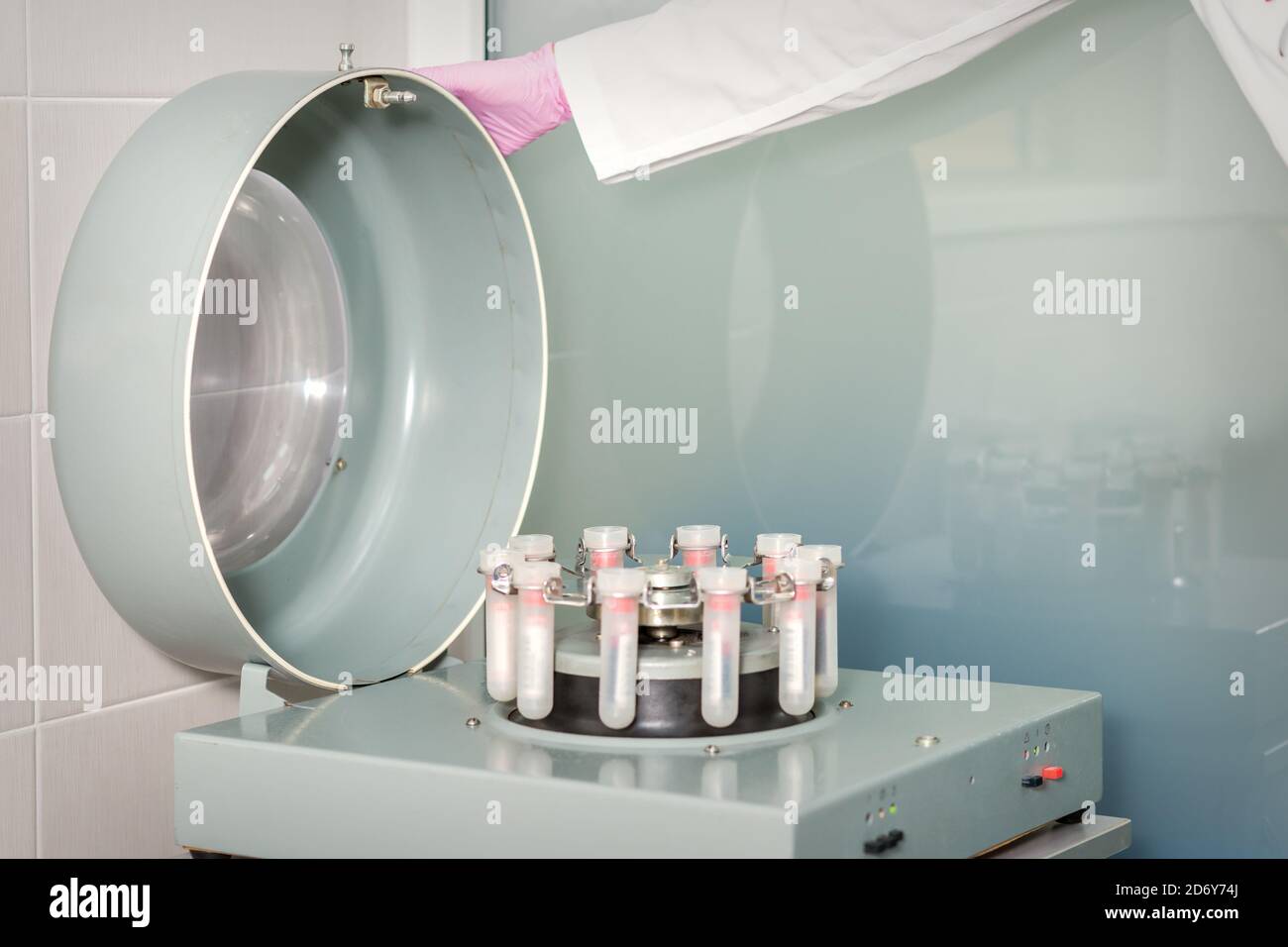 Centrifuge machine with the blood test tubes in the medical laboratory ...