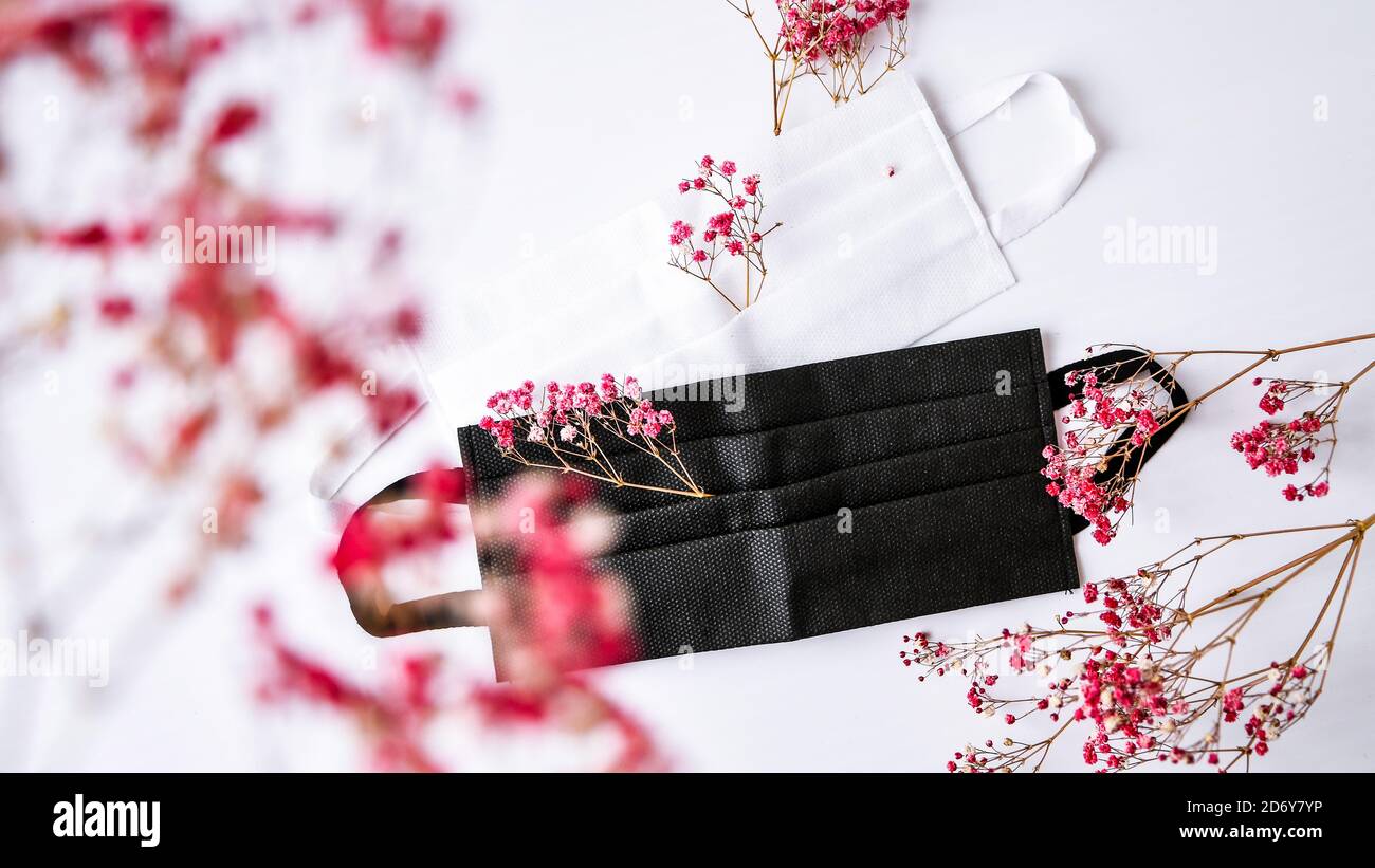 Choose reusable textile face mask. Reusable face mask with pink flowers ...