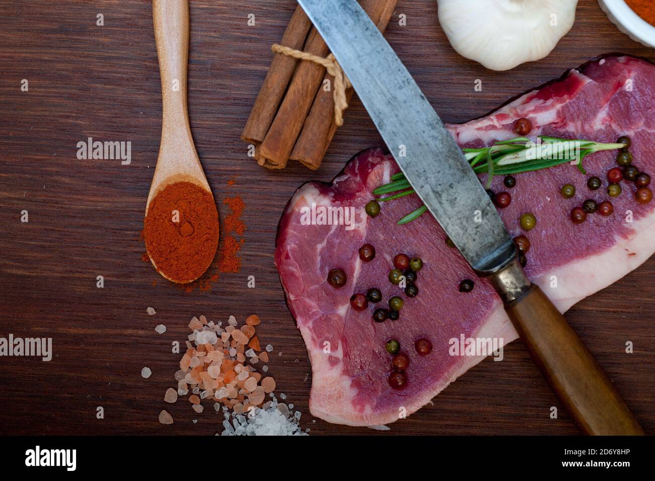 raw uncooked ribeye beef steak butcher selection Stock Photo - Alamy