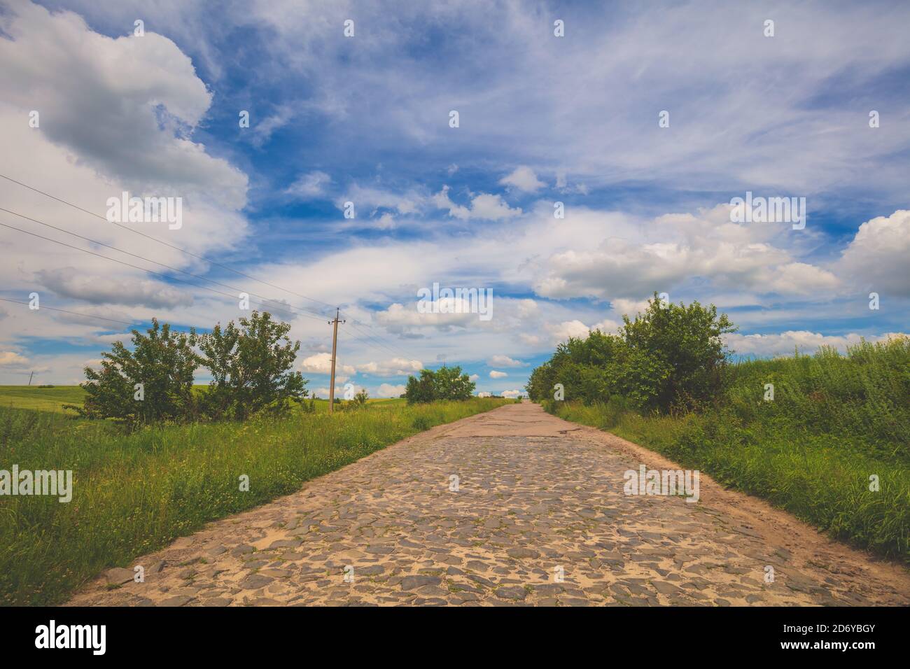 Cobblestone road sunny hi-res stock photography and images - Alamy