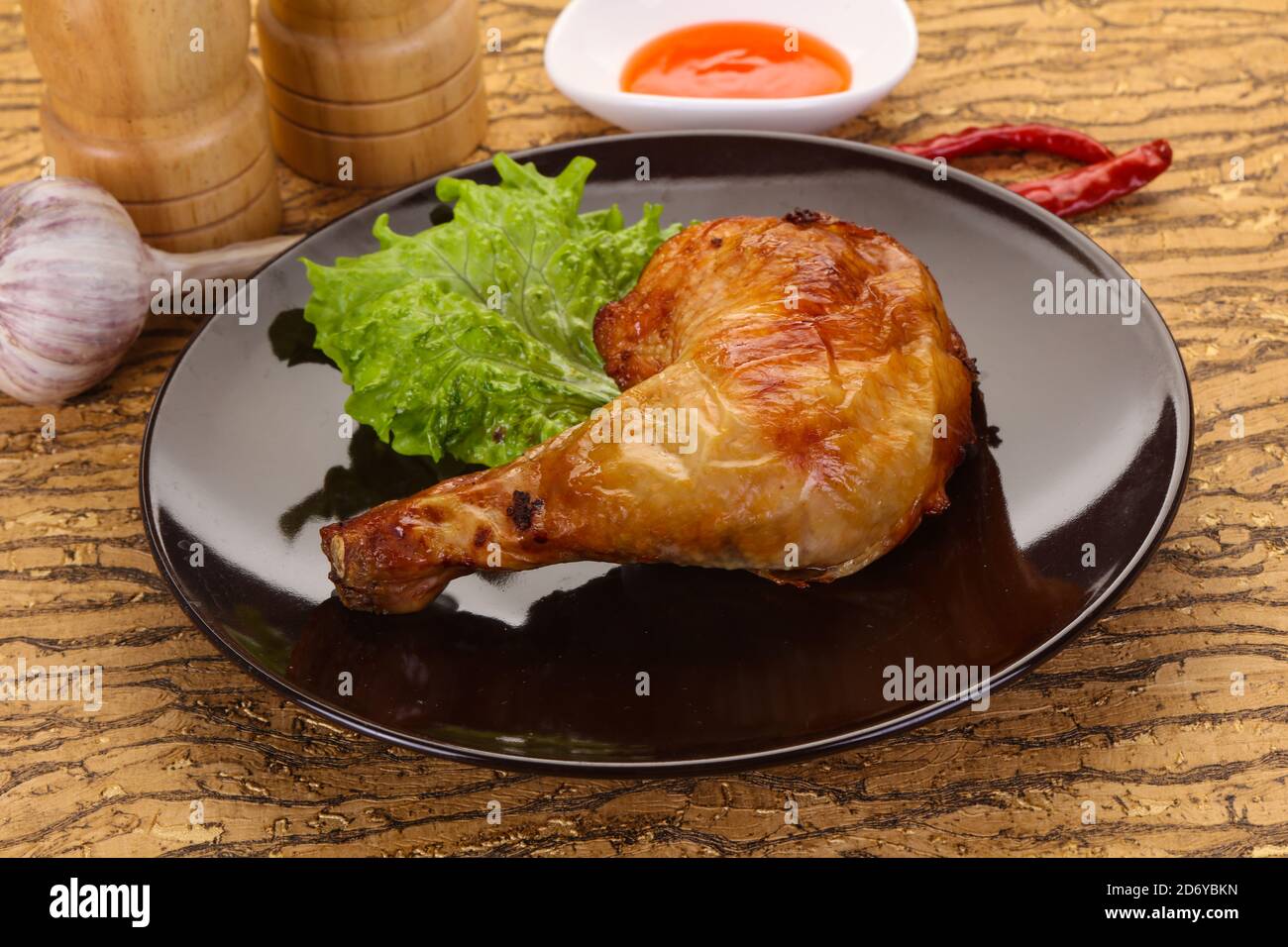 Crispy tasty Roasted chicken leg Stock Photo - Alamy