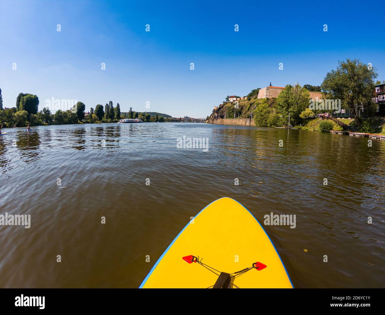 Paddleboarding in Vltava - Moldau river in Prague under Vysehrad ...