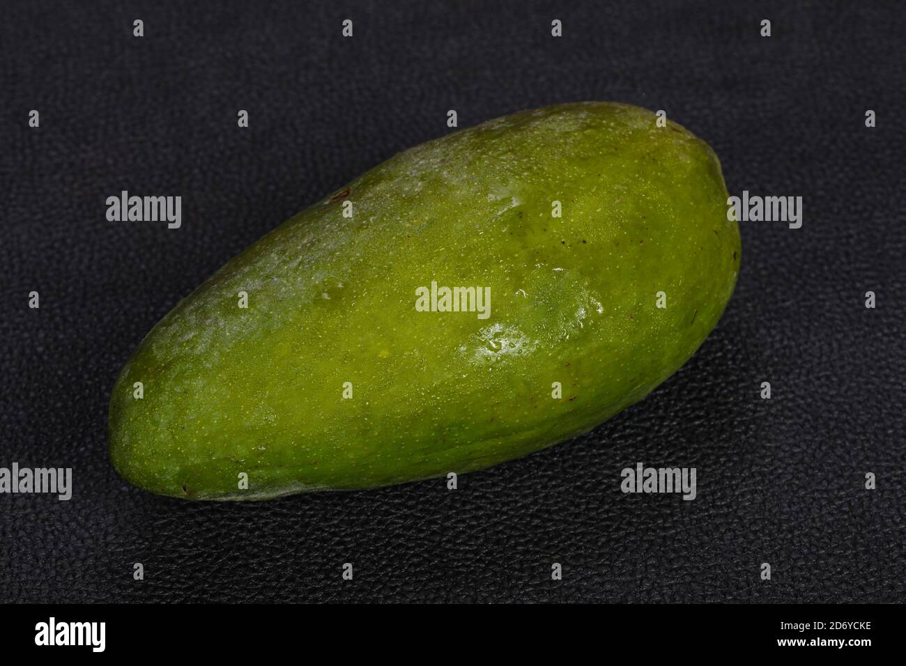 Green tasty mango over background Stock Photo - Alamy