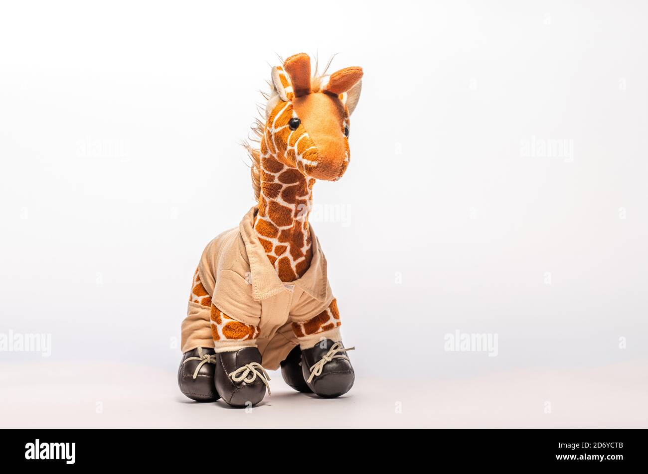 Toy giraffe hi-res stock photography and images - Alamy