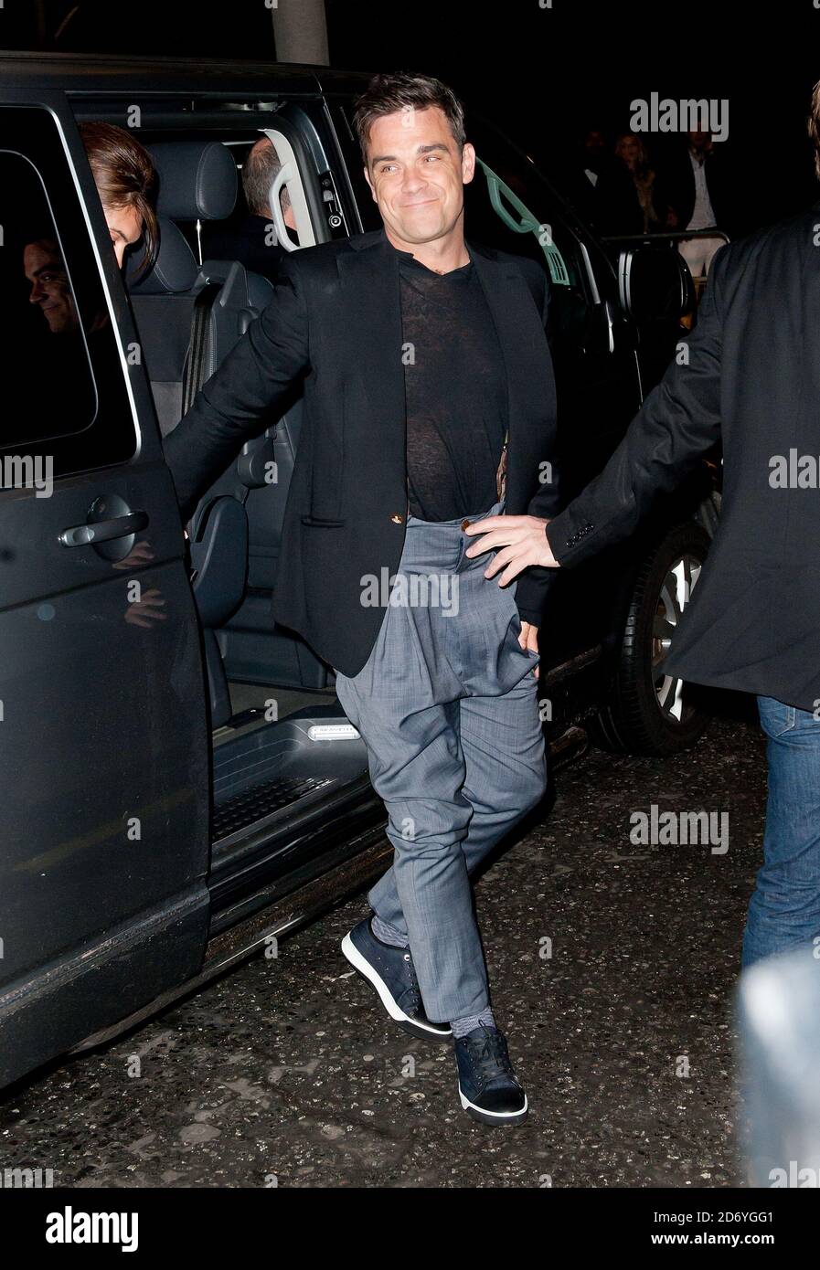 Robbie Williams arrives at the Universal Brit Awards party, at the ...