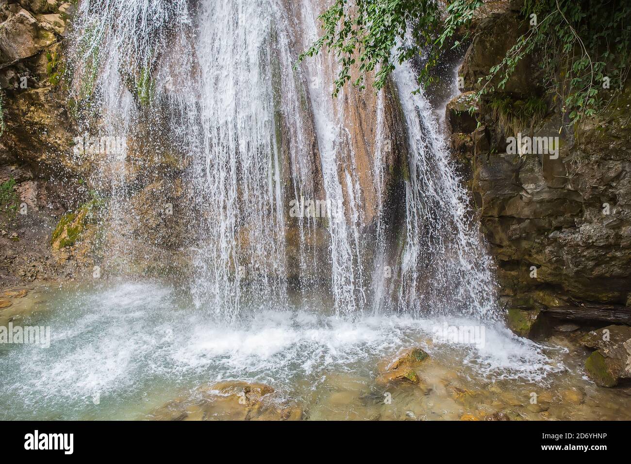 Roaring streams of water fall into lake. Wild life Stock Photo - Alamy