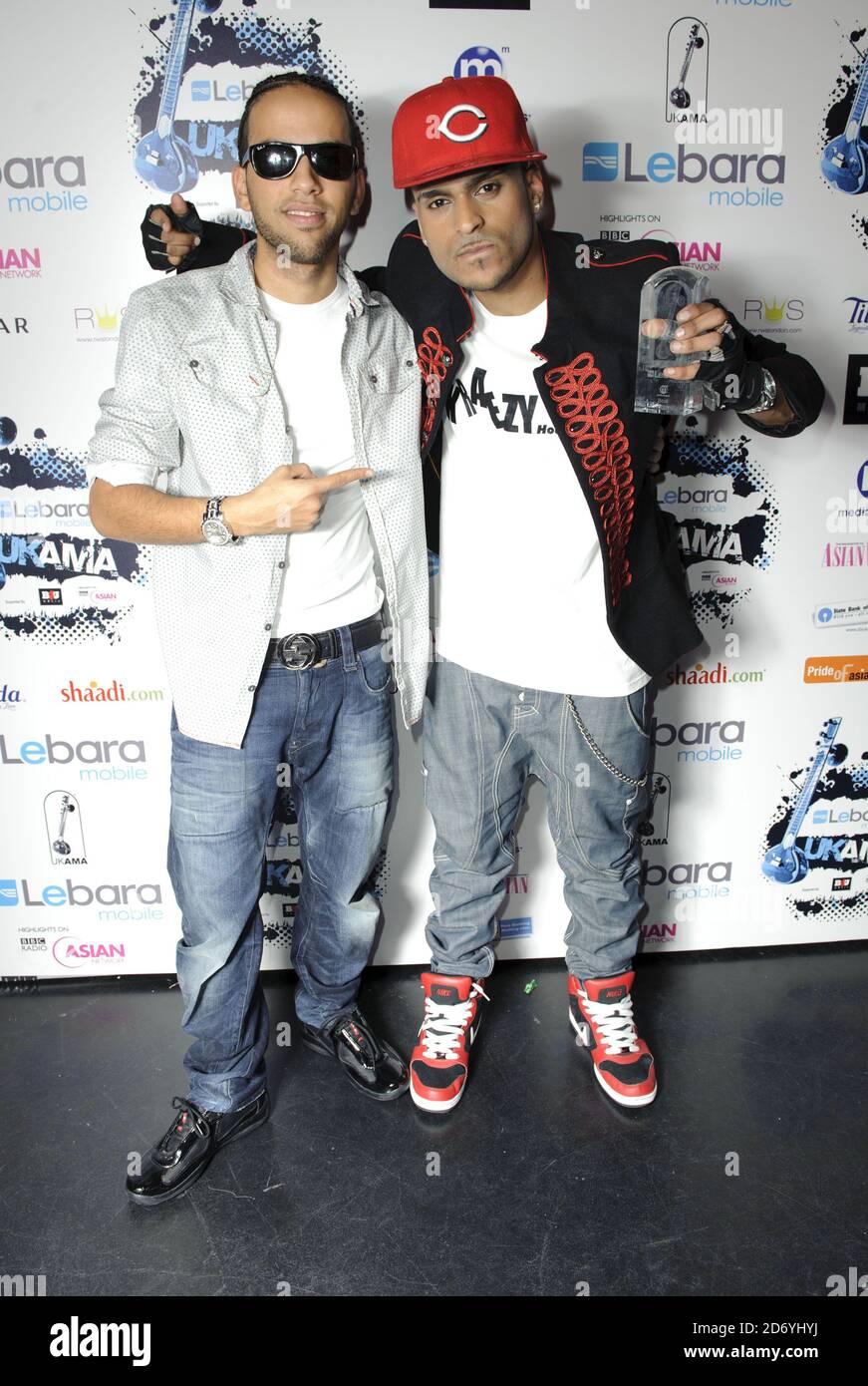 Best Best Newcomer award winner Jernade Miah (r) pictured with Aggro Santos backstage at the UK ...