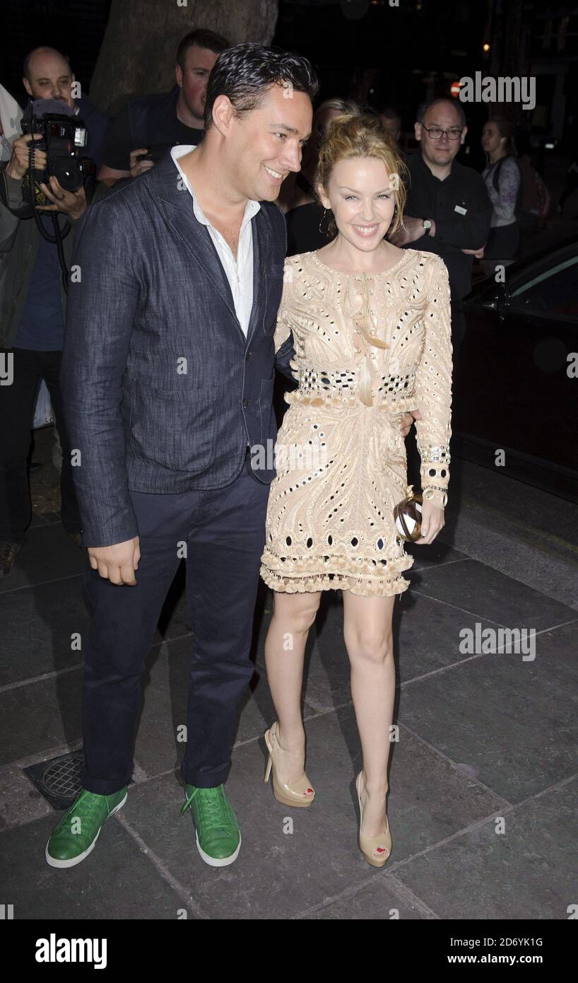 Kylie Minogue and director William Baker arrive at the Hurly Burly show ...