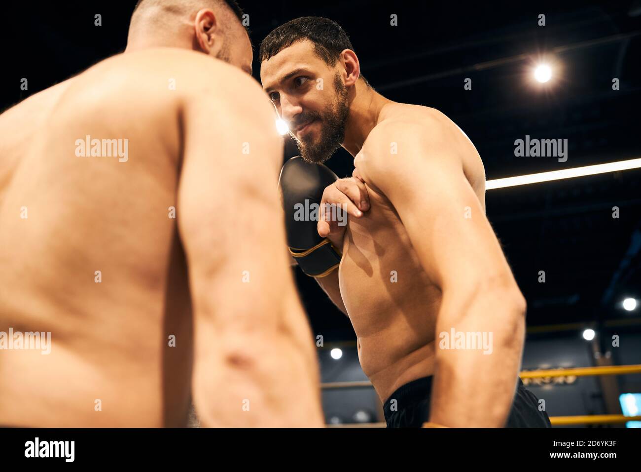 Threatening fighter looking in the face of his opponent Stock Photo - Alamy