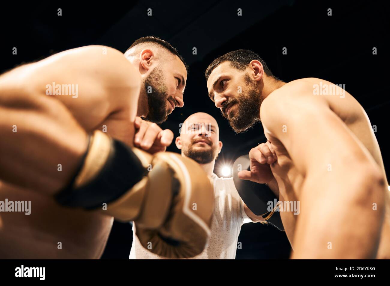 Two male boxers are exchanging angry glances Stock Photo - Alamy